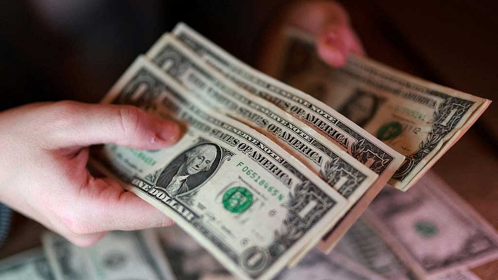 Dollar wobbles as markets cling to hopes for West Asia peace deal