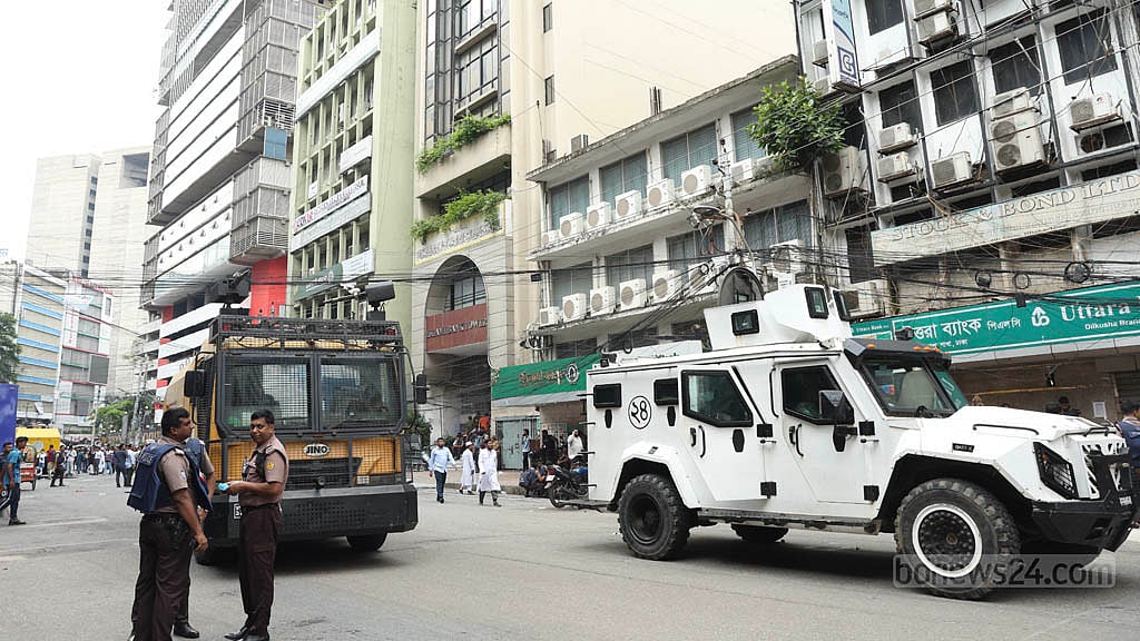 Tear gas, water cannon break Islami Bank protest